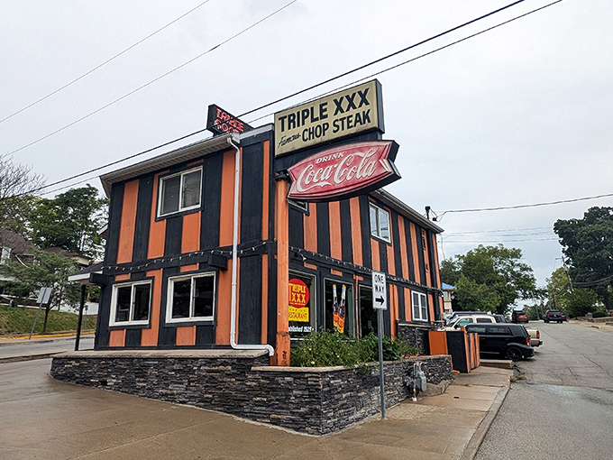 The iconic orange-and-black exterior stands defiant against an Indiana snowfall, like a warm beacon of comfort food calling through the winter chill.