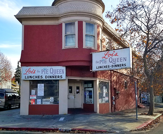 The unassuming corner facade of Lois the Pie Queen stands like a culinary lighthouse in Oakland, promising comfort food treasures to those in the know.