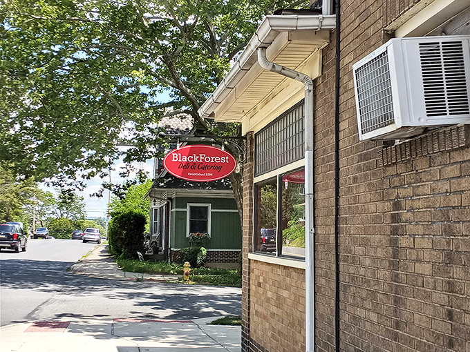 A humble brick exterior with a bright red sign that belies the culinary treasures within. This unassuming storefront in Bethlehem is where food dreams come true.