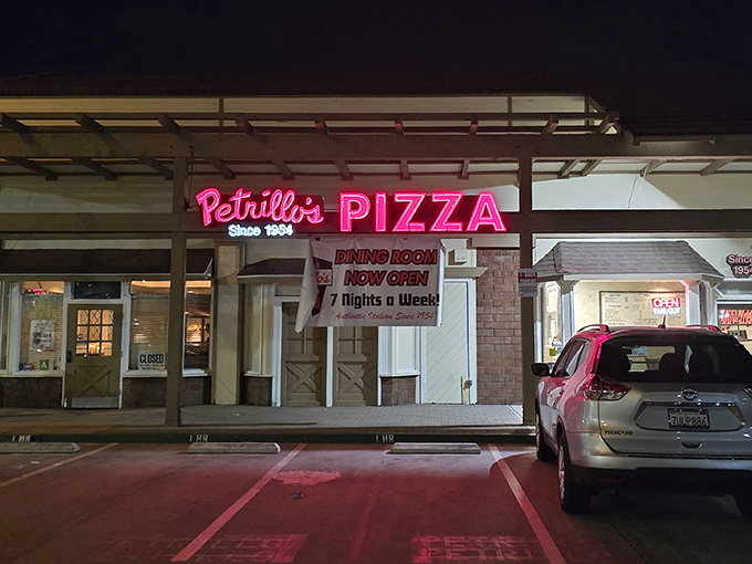 The iconic red sign beckons like a lighthouse for the pizza-obsessed. Since 1954, this Glendora institution has been proving that sometimes the best things don't change.