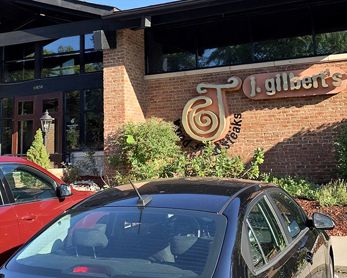 That distinctive brick facade and elegant signage promise culinary adventures that'll make your neighbors jealous of your dinner plans.