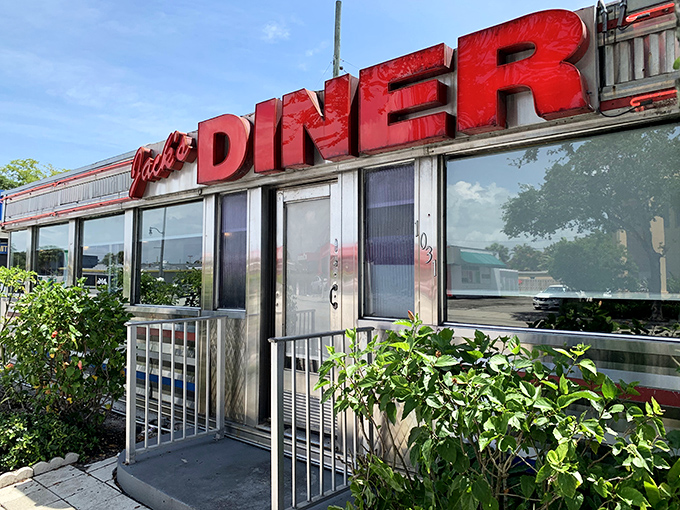 The classic diner silhouette against Florida's blue sky feels like a time machine with palm trees&mdash;nostalgic Americana meets tropical paradise.