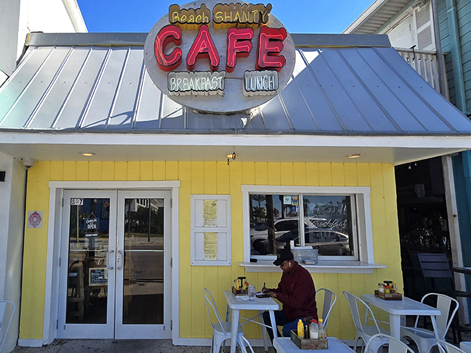 The cheerful yellow exterior of Beach Shanty Cafe beckons like a sunrise, promising breakfast treasures just steps from Clearwater's famous white sands.