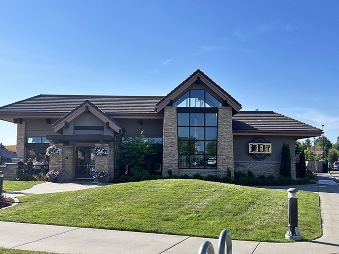 Architectural ambition meets mountain charm at Bardenay's Coeur d'Alene location, where stone pillars and timber beams welcome hungry travelers like an upscale lodge for food enthusiasts.