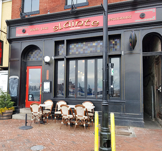 The crimson fa&ccedil;ade of Slainte stands proudly on Thames Street, Irish flag waving between American ones&mdash;a diplomatic sandwich of international goodwill.
