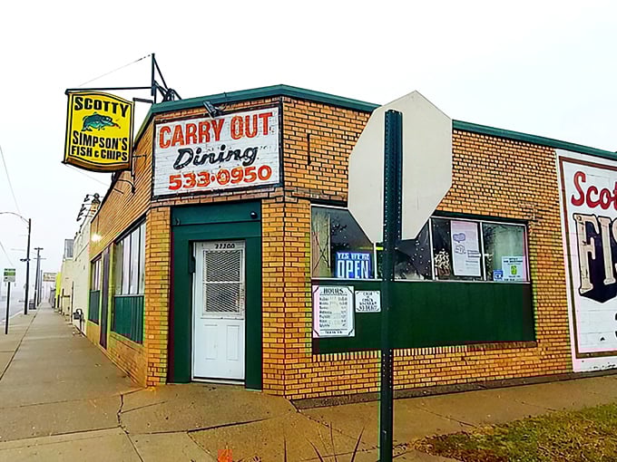 The yellow sign beckons like a lighthouse for hungry souls. This unassuming brick building on Fenkell Avenue has been Detroit's temple of fried fish for generations.