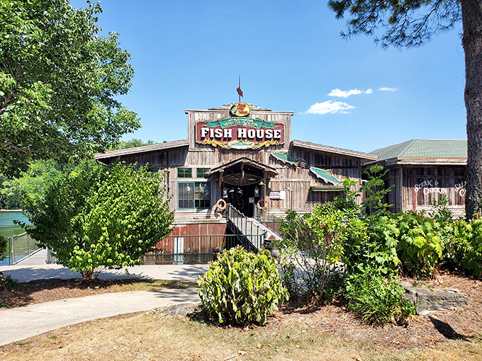 The rustic wooden exterior of White River Fish House beckons like an old friend, promising authentic Ozark flavors within its weathered walls.