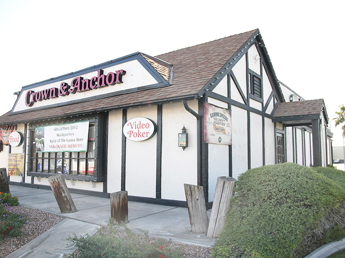 A slice of England in the desert! The Crown & Anchor's white-washed exterior and iconic London taxi promise authentic British charm just minutes from the Strip.