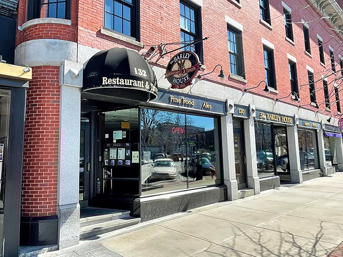 The classic red brick fa&ccedil;ade of The Barley House beckons like an old friend, with cheerful red umbrellas promising good times on the patio.