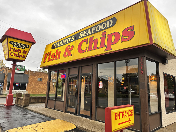 The bright yellow beacon of Marino's stands out like a culinary lighthouse, guiding hungry Columbus residents to seafood salvation regardless of weather.