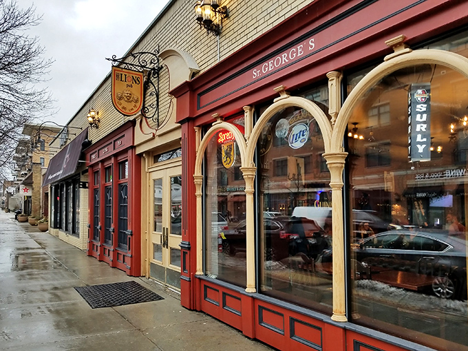 The iconic red facade of Three Lions Pub beckons like a British embassy on Wisconsin soil, promising authentic flavors and football matches on the telly.
