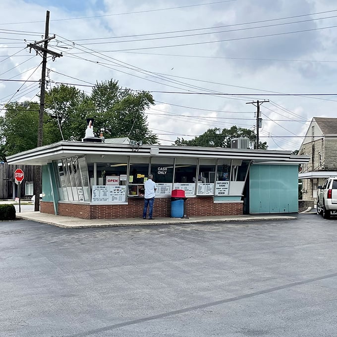 That top-hat-wearing chicken statue isn't just a mascot&mdash;it's a beacon of hope for hungry travelers on the Illinois highways.