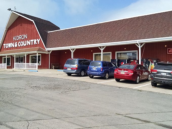 The iconic red barn exterior of Kidron Town & Country Market stands as a beacon of comfort food in Ohio's Amish Country. No fancy frills, just fantastic flavors waiting inside.