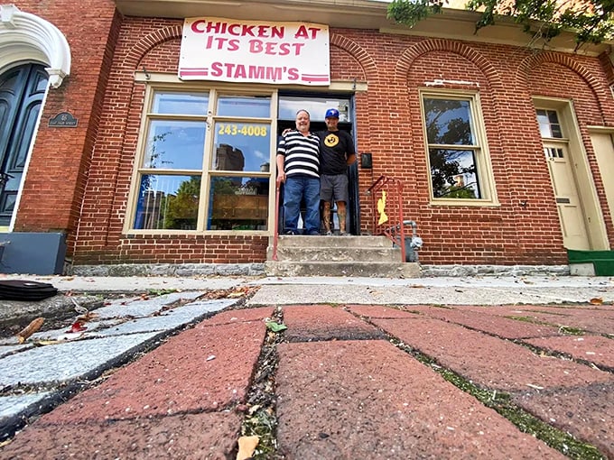 The unassuming brick facade of Grandma Stamm's promises "CHICKEN AT ITS BEST" - a humble claim that somehow manages to be an understatement.