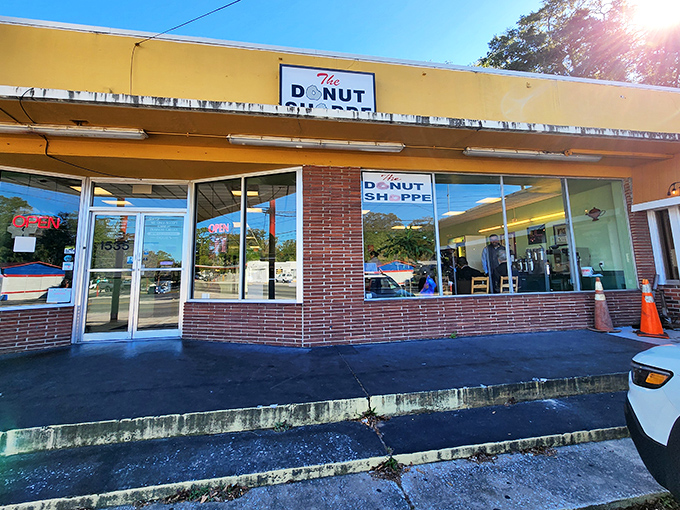 The unassuming storefront of The Donut Shoppe stands as a beacon of sweet salvation for Jacksonville's early risers. No fancy frills, just donut thrills.