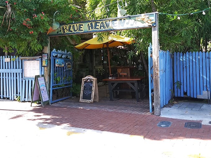 The entrance to Blue Heaven feels like stepping through a portal to a tropical wonderland where time slows down and appetites awaken.