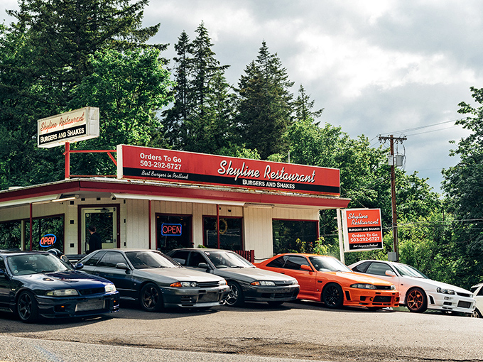 The red and white exterior of Skyline Restaurant stands like a beacon for burger enthusiasts, promising simple pleasures in a complicated world.