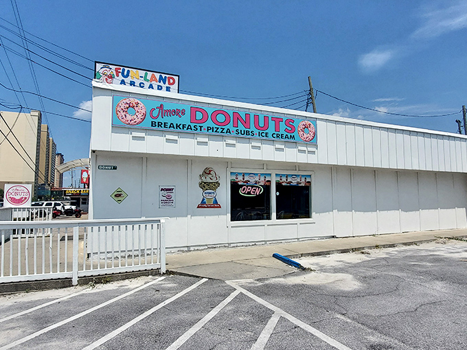 The unassuming white exterior of A'More Donuts hides culinary treasures within, like finding a Picasso at a yard sale.