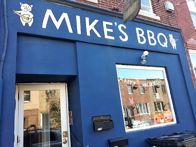 The bright blue fa&ccedil;ade of Mike's BBQ stands out like a beacon of smoky promise on South 11th Street. That little pig logo knows what's coming.