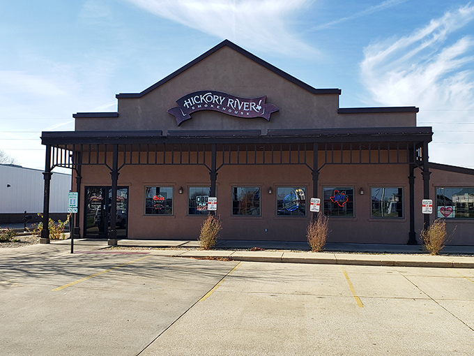 The unassuming exterior of Hickory River Smokehouse stands like a beacon of barbecue hope in Springfield, promising smoky treasures within.