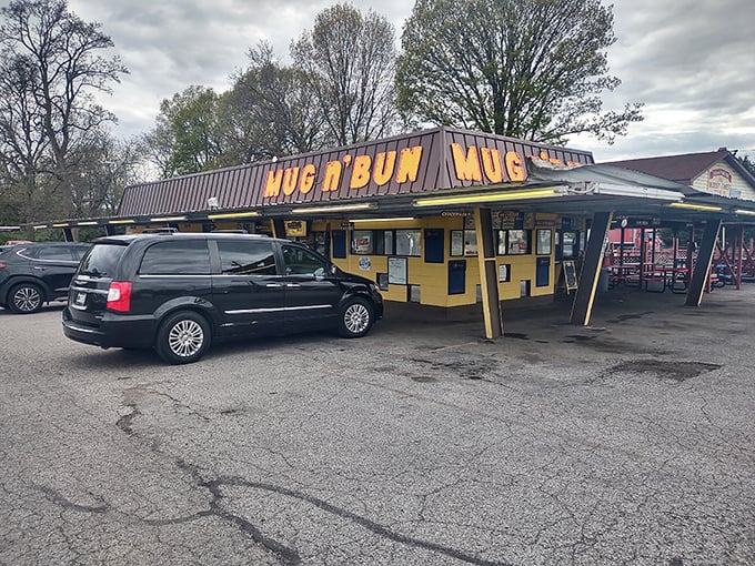 The iconic orange lettering of Mug-n-Bun against the Indiana sky promises a time-traveling culinary adventure that your taste buds won't soon forget.