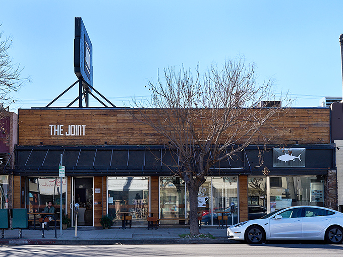 The wooden fa&ccedil;ade of The Joint feels like a secret handshake &ndash; understated, welcoming, and promising something special behind those doors.