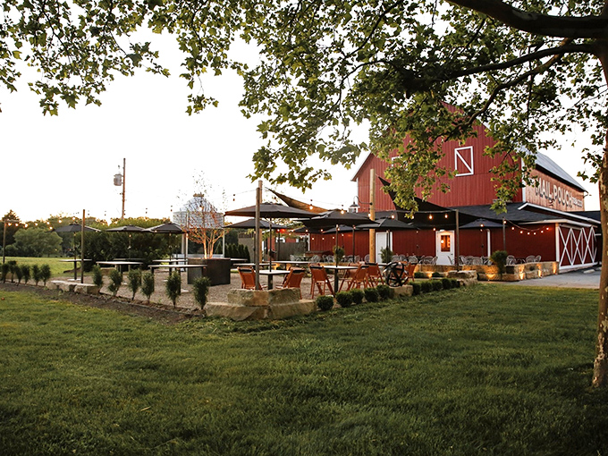 The red barn exterior isn't just charming&mdash;it's a beacon for carnivores. Those string lights promise magic happens inside these rustic walls.