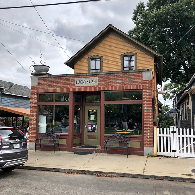Lucky's brick exterior with its vibrant yellow accents stands as a beacon of culinary hope in Cleveland's historic Tremont neighborhood.