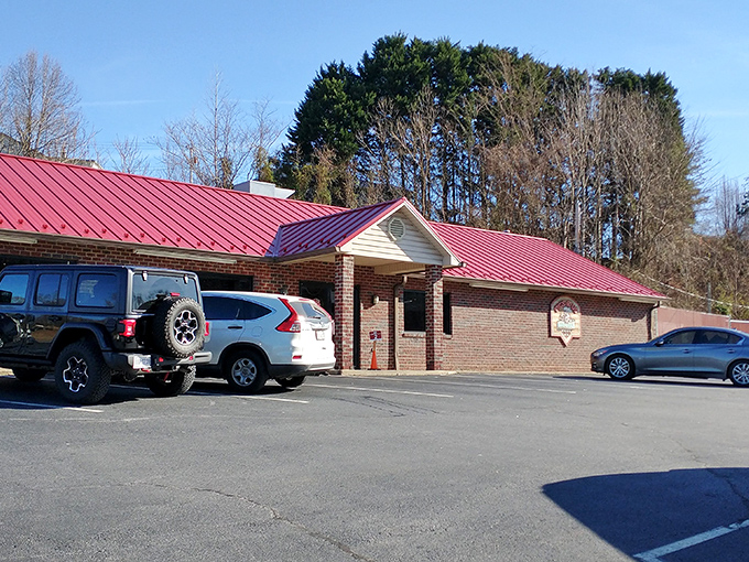 The unassuming brick exterior with its distinctive red roof houses barbecue treasures that would make even the most stoic Virginian weep with joy.