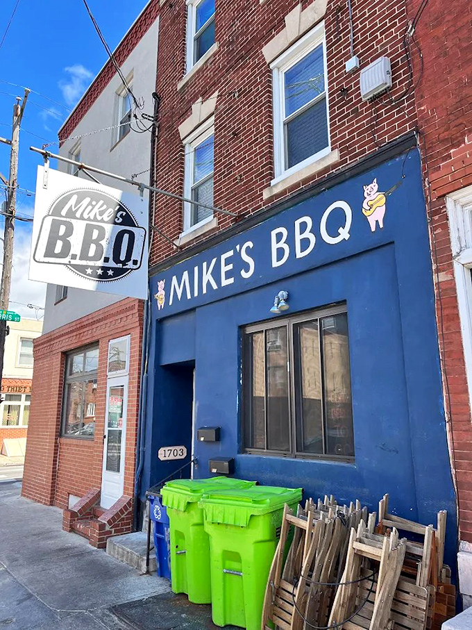 The bright blue fa&ccedil;ade of Mike's BBQ stands out like a beacon of smoky promise on South 11th Street. That little pig logo knows what's coming.