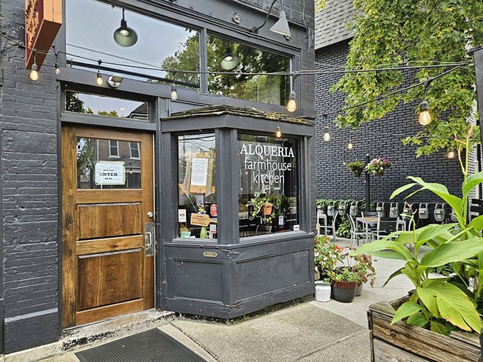 Curb appeal that stops traffic! Alqueria's flower-adorned exterior in Columbus promises the kind of farm-to-table experience that makes your stomach growl from the sidewalk.