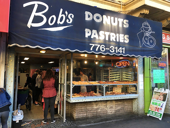 That blue awning beckons like a lighthouse for sugar-starved souls wandering Polk Street's bustling sidewalks.