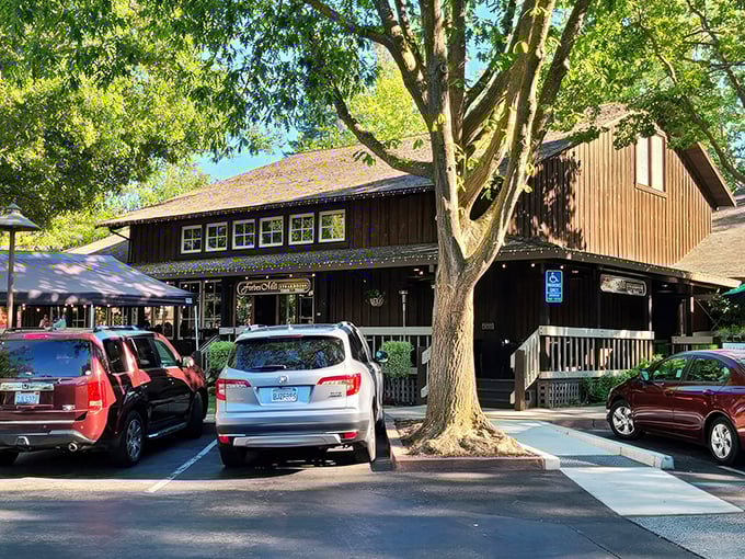 The rustic charm of Forbes Mill's exterior belies the culinary sophistication waiting inside. Those twinkling lights aren't just decoration—they're a beacon for steak lovers.