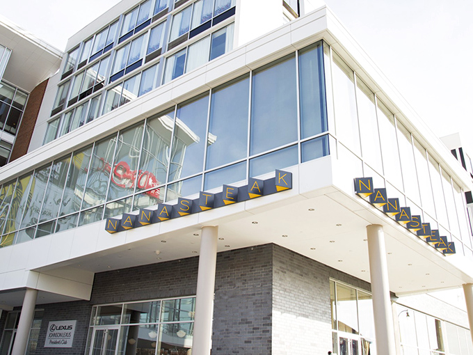 NanaSteak's illuminated sign beckons like a lighthouse for hungry souls wandering the streets of Durham, promising salvation in steak form.