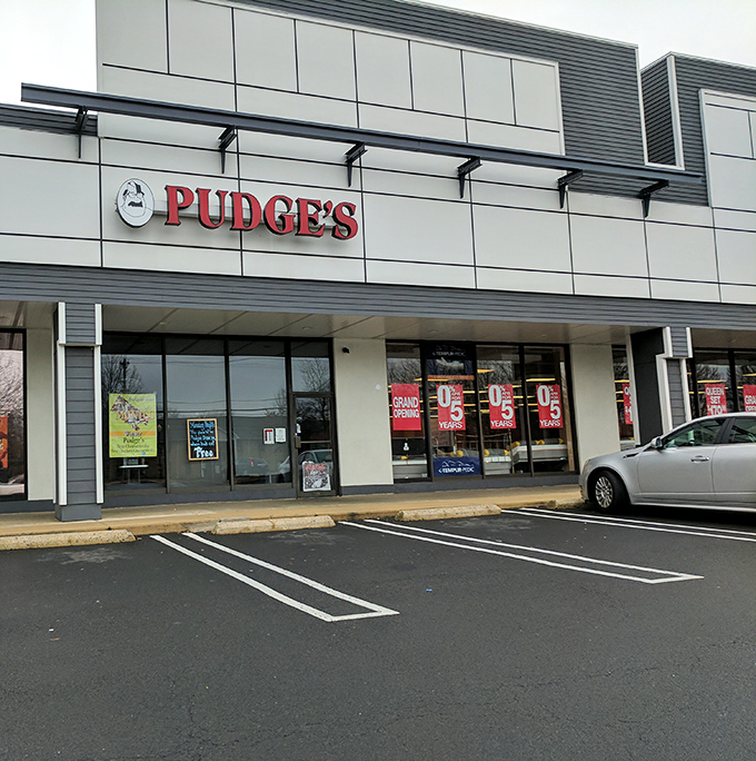 The storefront beckons like a lighthouse for the hungry. Pudge's bold red sign promises salvation from ordinary sandwiches in suburban Blue Bell.