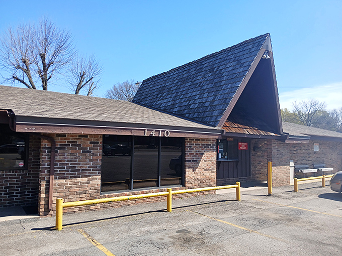 The unassuming A-frame entrance of Feltner's Whatta-Burger stands like a burger beacon in Russellville, promising no-frills deliciousness inside.