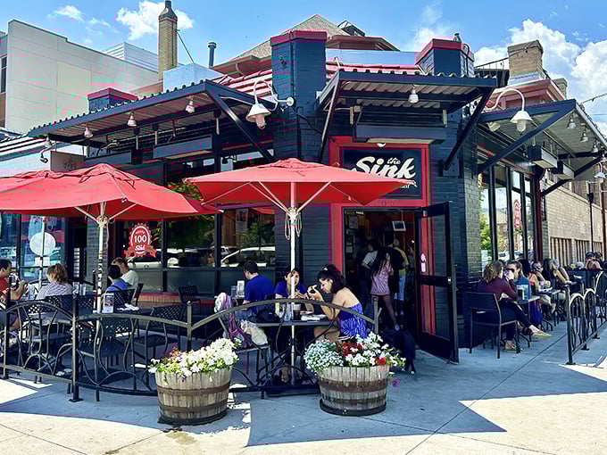 The Sink's iconic black exterior with red trim welcomes hungry pilgrims to this Boulder institution. Those red umbrellas promise shade for your burger-induced euphoria.