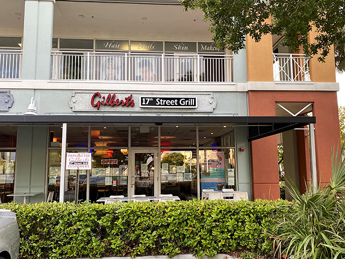 That red neon sign isn't just illuminating the night&mdash;it's a beacon calling to burger lovers everywhere. Simple storefront, extraordinary flavors waiting inside.