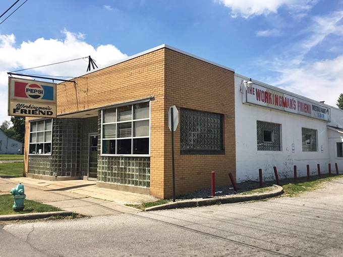 The unassuming exterior hides culinary greatness like a superhero's secret identity. This Indianapolis landmark doesn't need fancy signage to announce its burger supremacy.