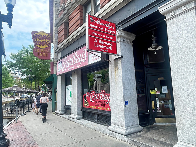 The iconic red signage of Mr. Bartley's stands as a beacon of burger excellence in Harvard Square, promising culinary salvation to hungry scholars and visitors alike.