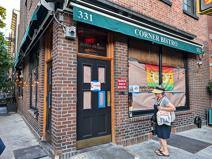 The neon glow of Corner Bistro's sign beckons hungry pilgrims like a burger lighthouse in the West Village night. New York's culinary North Star.
