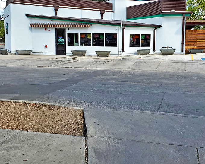 The unassuming exterior of Chris Madrid's proves once again that culinary treasures often hide behind modest facades. San Antonio's burger paradise awaits!