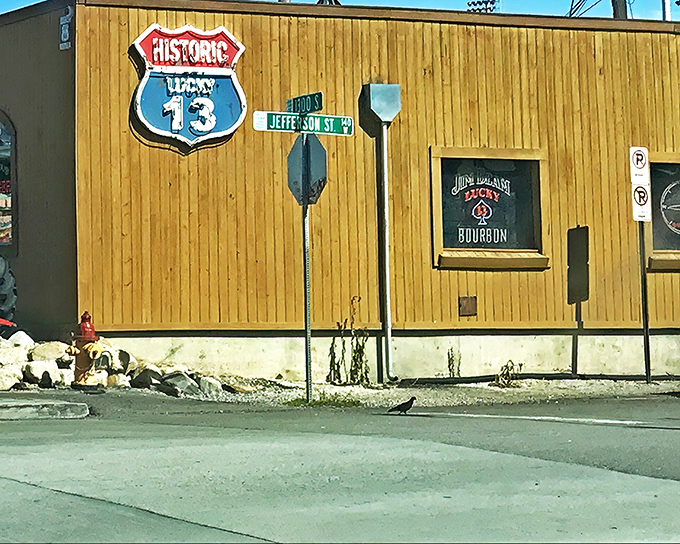 The unassuming wooden exterior of Lucky 13 promises little but delivers everything. That "Liquid Aloha" umbrella is practically winking at you.