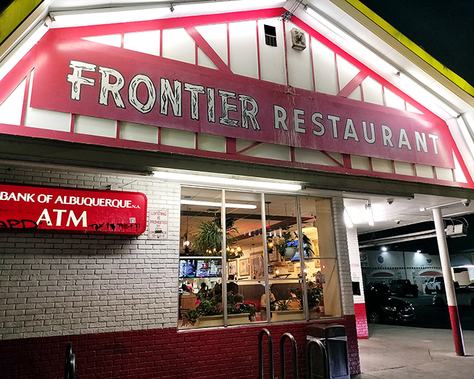 The iconic red and white facade of Frontier Restaurant glows like a beacon for hungry souls wandering Central Avenue after dark.