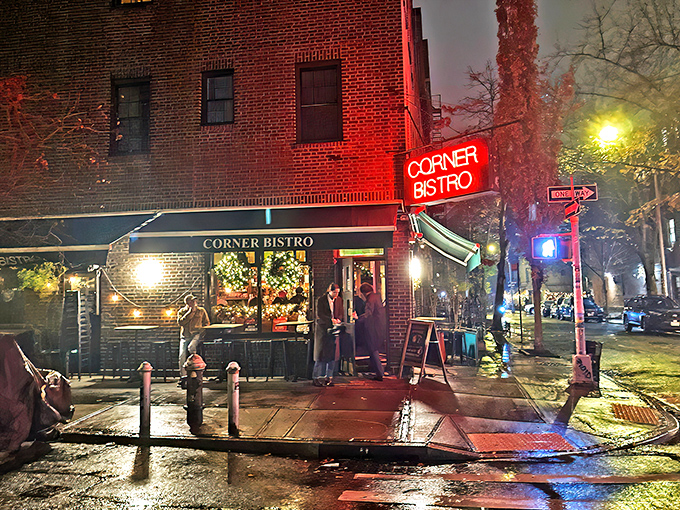 The neon glow of Corner Bistro's sign beckons hungry pilgrims like a burger lighthouse in the West Village night. New York's culinary North Star.