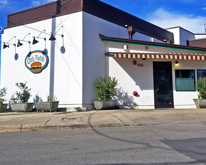 The unassuming exterior of Chris Madrid's proves once again that culinary treasures often hide behind modest facades. San Antonio's burger paradise awaits!