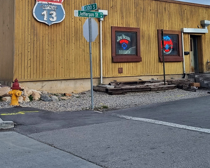 The unassuming wooden exterior of Lucky 13 promises little but delivers everything. That "Liquid Aloha" umbrella is practically winking at you.