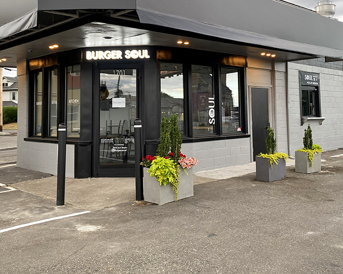 The sleek black exterior of Burger Seoul stands as a beacon of burger brilliance in Tacoma, promising culinary adventures that await inside.