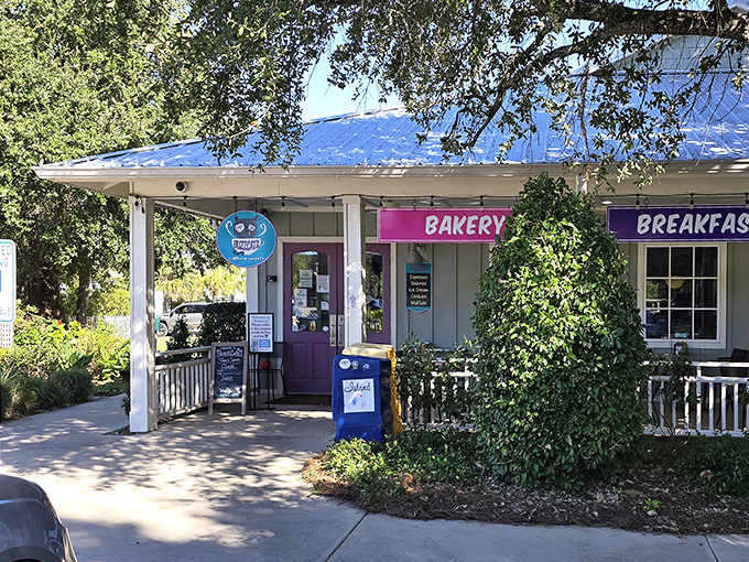 The unassuming exterior of BuzzCatz with its cheerful purple door promises culinary treasures within. Like finding a diamond in a beach town&mdash;this place delivers.