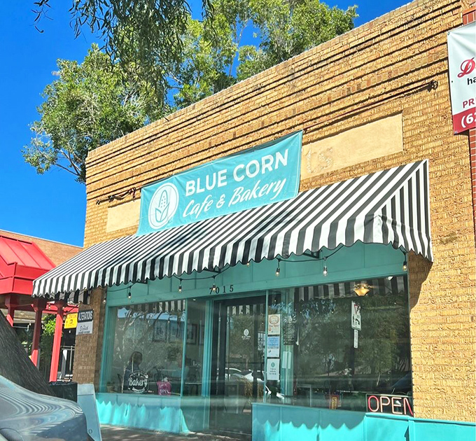 The charming turquoise storefront with its classic black-and-white striped awning stands out like a culinary oasis in historic downtown Glendale.